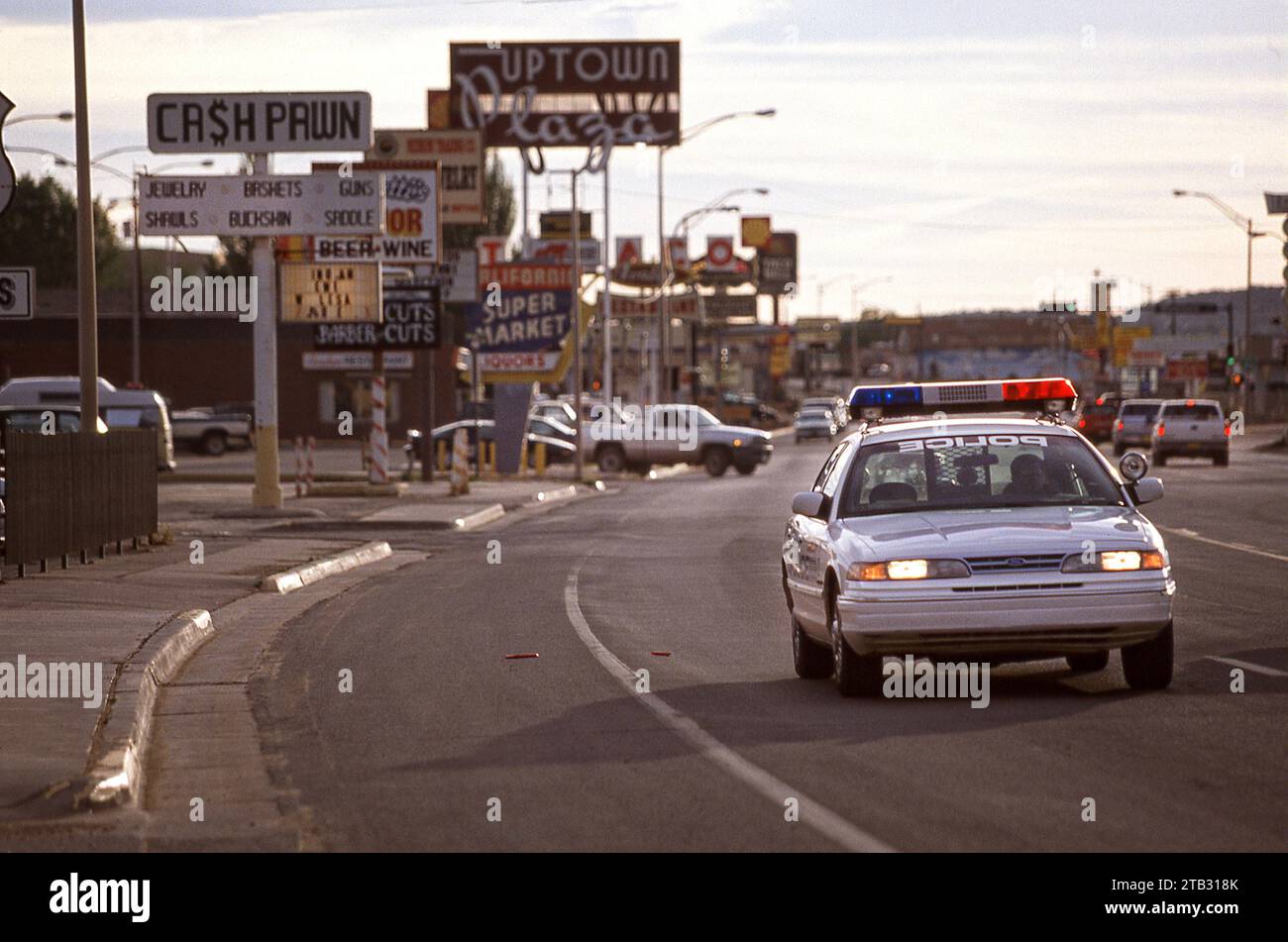 Local police car on Route 66 Gallup New Mexico USA. Road trip in the ...