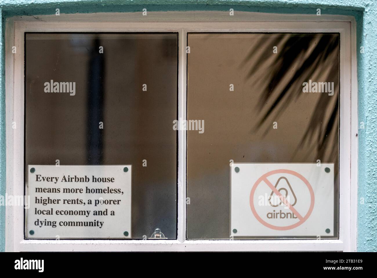 Brighton, December 4th 2023: Anti Air BnB posters in the window of a ...
