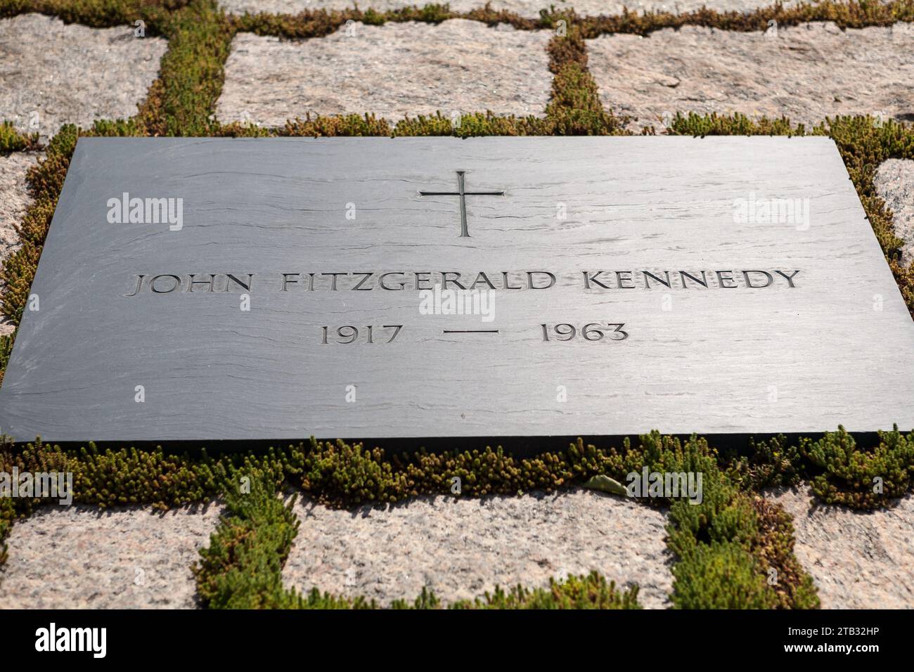Memorial plaque on the grave of John Fitzgerald Kennedy in Arlington Cemetery. Washington, DC ...