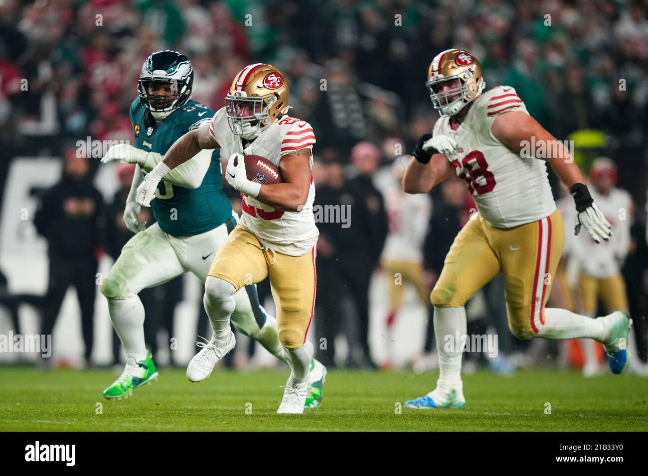 San Francisco 49ers' Elijah Mitchell runs during an NFL football game ...