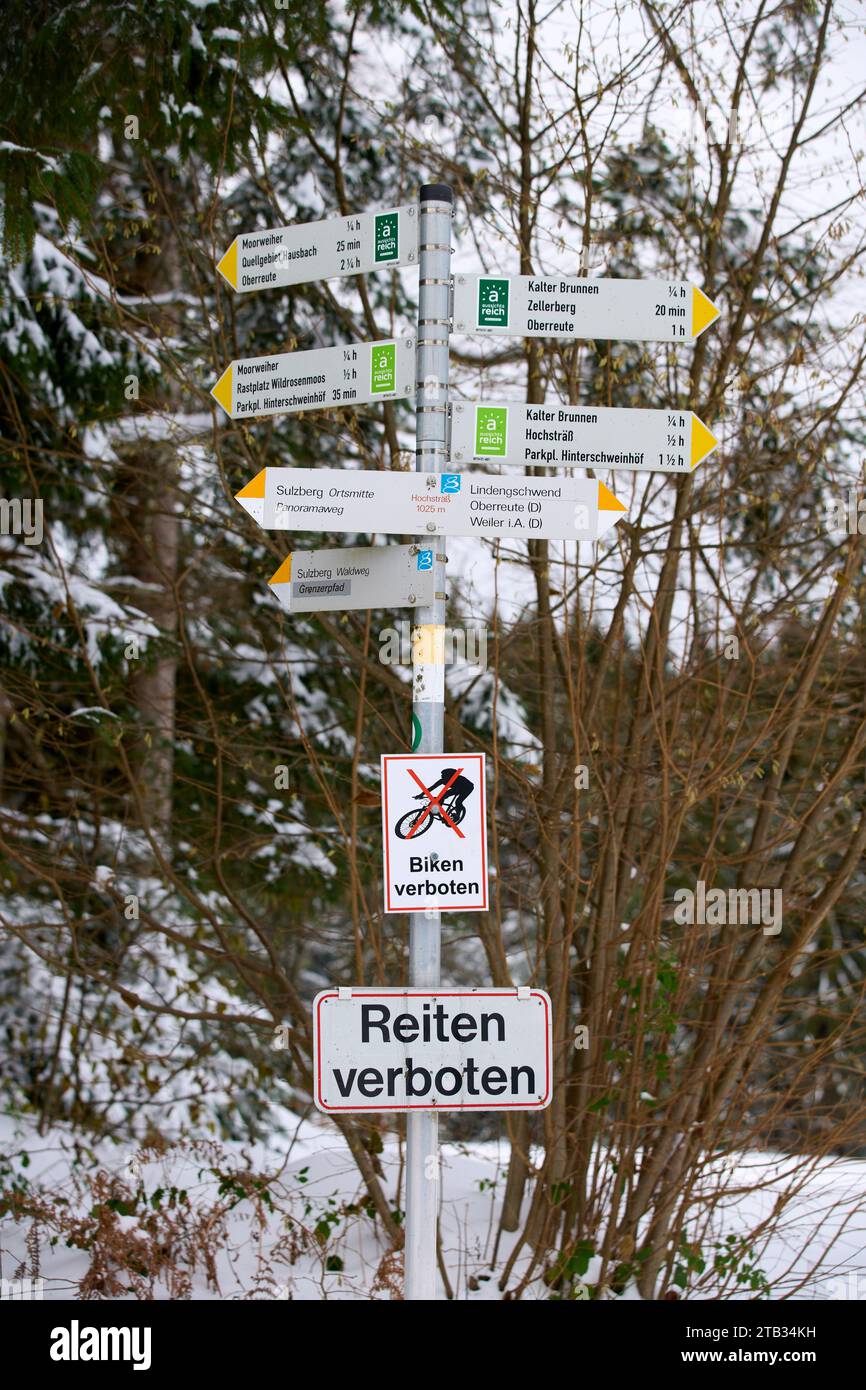 Multi purpose direction signpost at a trekking path in Sulzberg ...