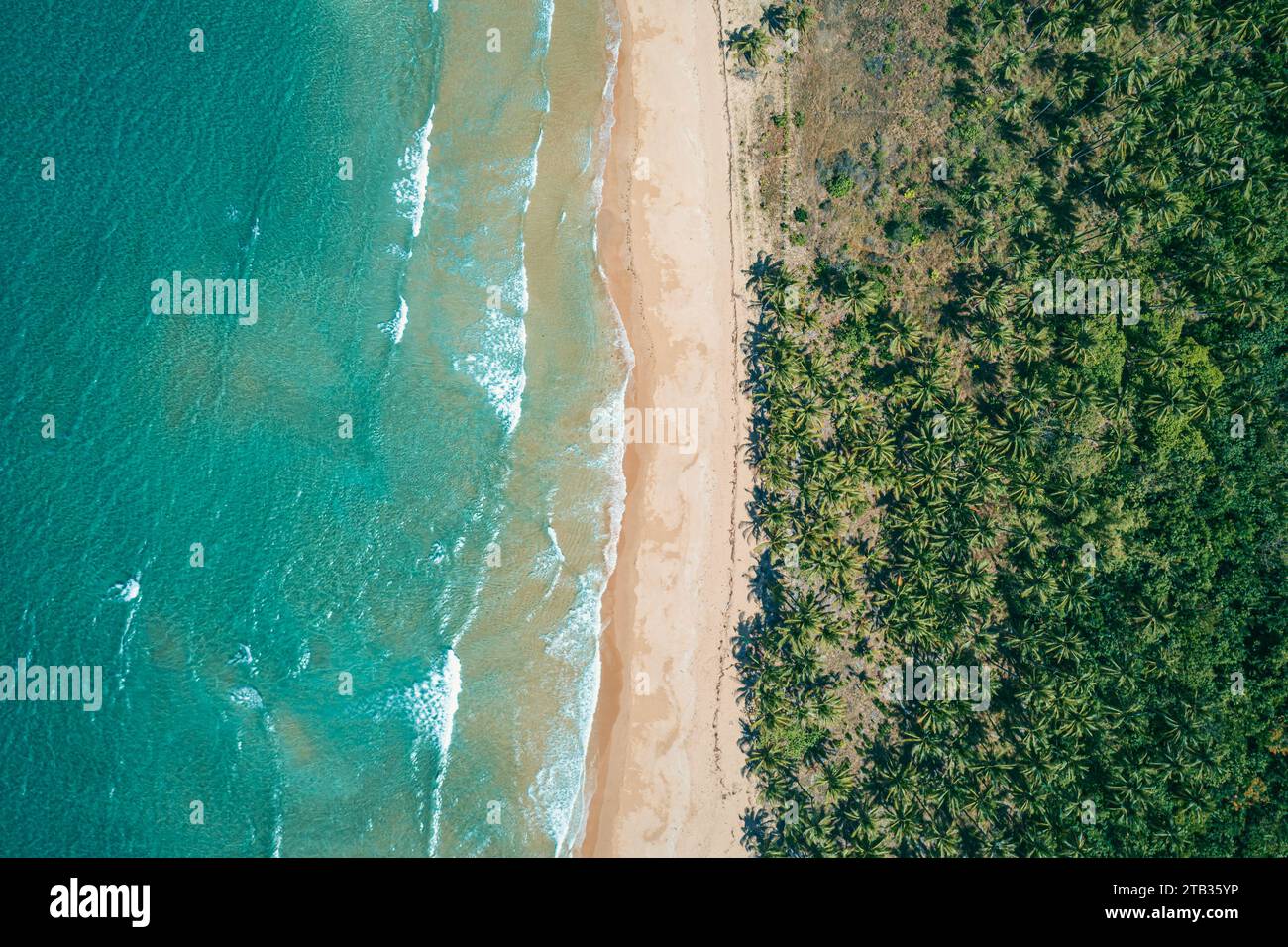 Aerial view to tropical sandy beach and blue ocean. Top view of ocean ...