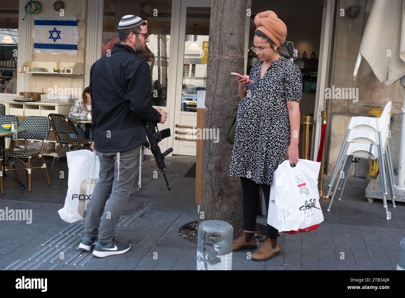 Shoresh, Israel. 04th Dec, 2023. An Israeli civilian couple with their ...