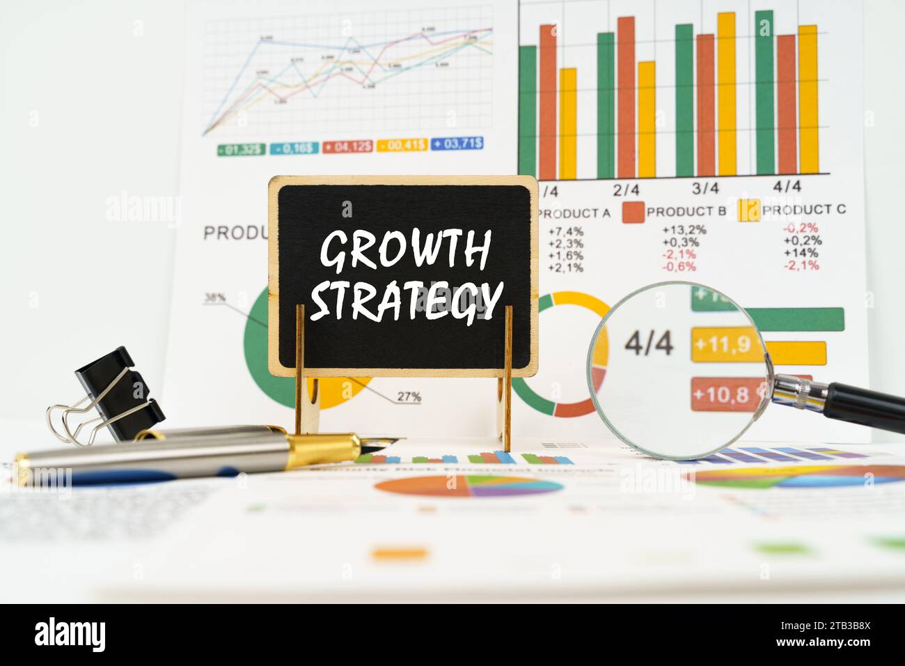 Business concept. Against the background of business graphs, a board ...