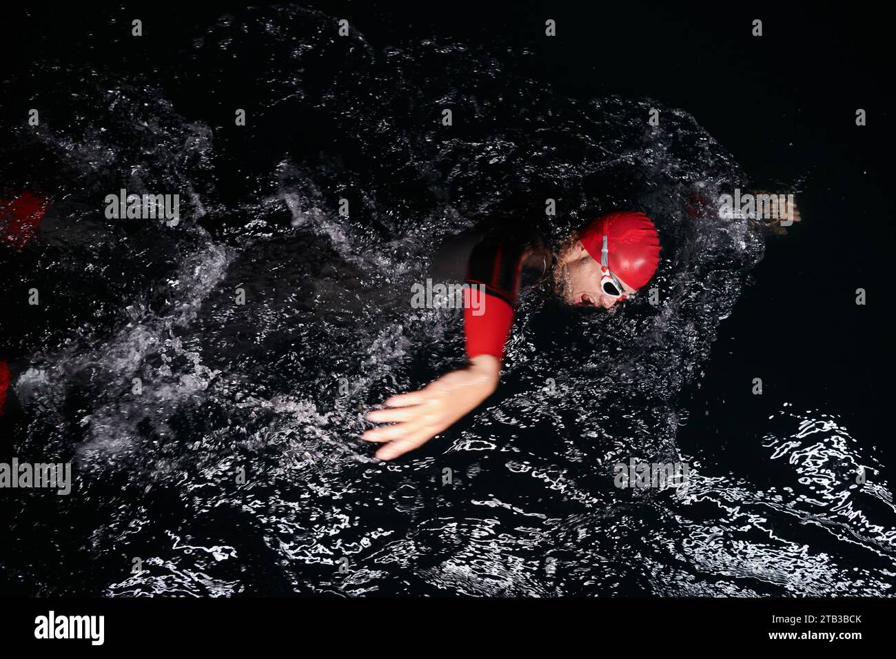 A determined professional triathlete undergoes rigorous night time ...