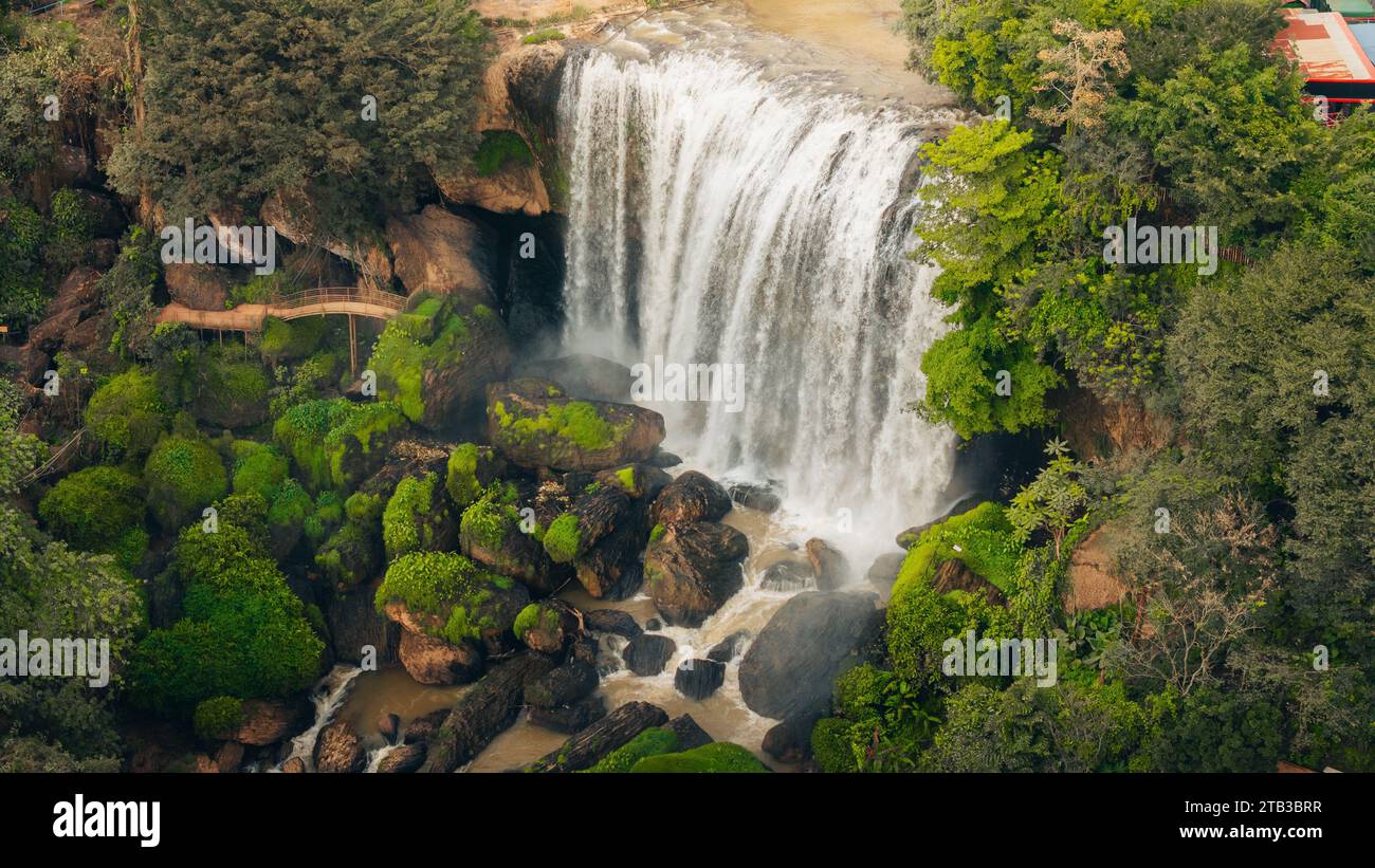Aerial view of Thac Voi - Elephant waterfall, forest and city scene ...