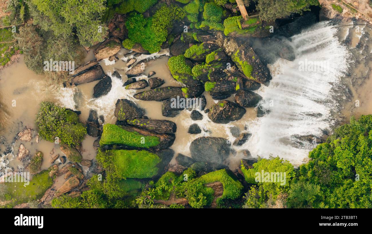 Aerial view of Thac Voi - Elephant waterfall, forest and city scene ...