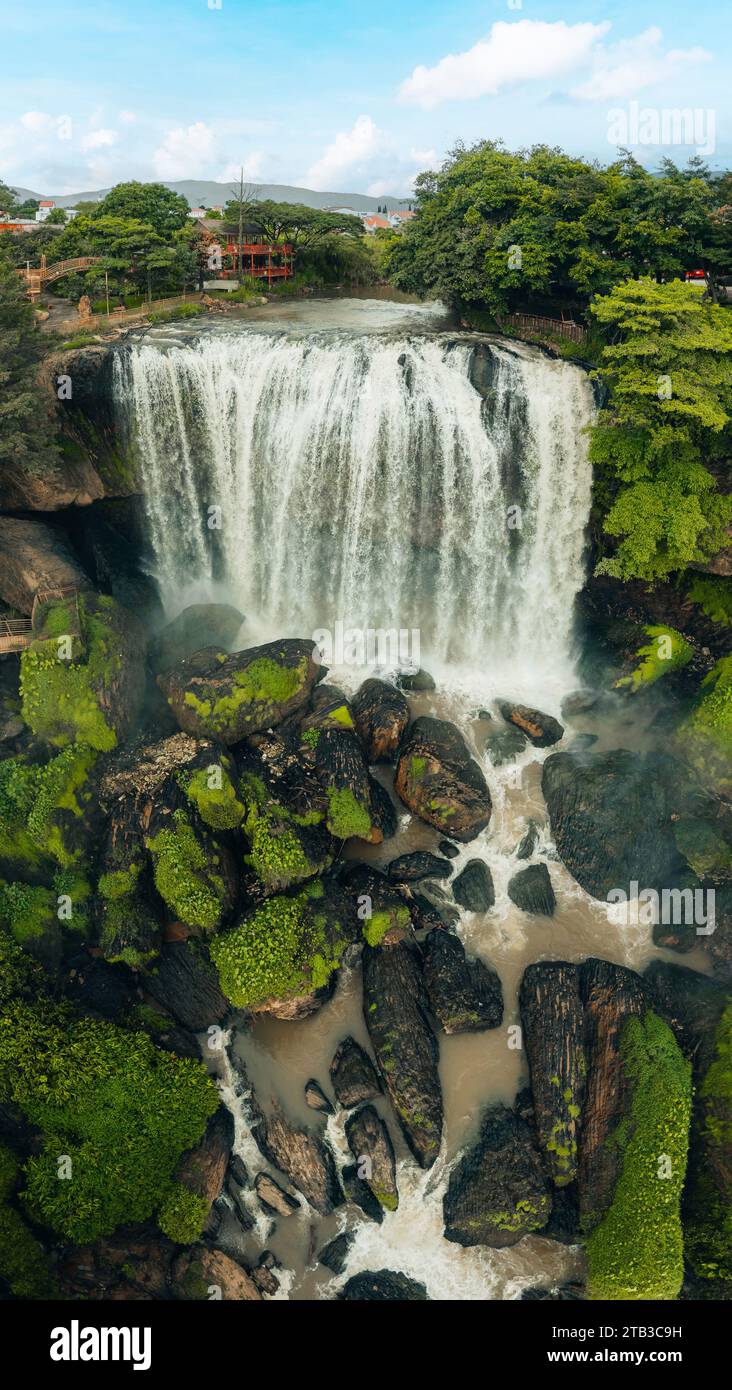 Aerial view of Thac Voi - Elephant waterfall, forest and city scene ...