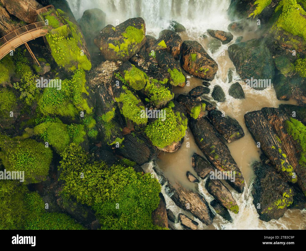 Aerial view of Thac Voi - Elephant waterfall, forest and city scene ...