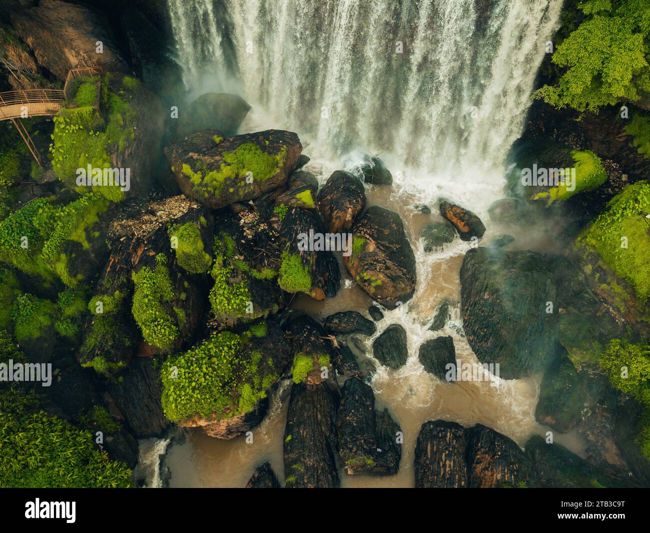 Aerial view of Thac Voi - Elephant waterfall, forest and city scene ...