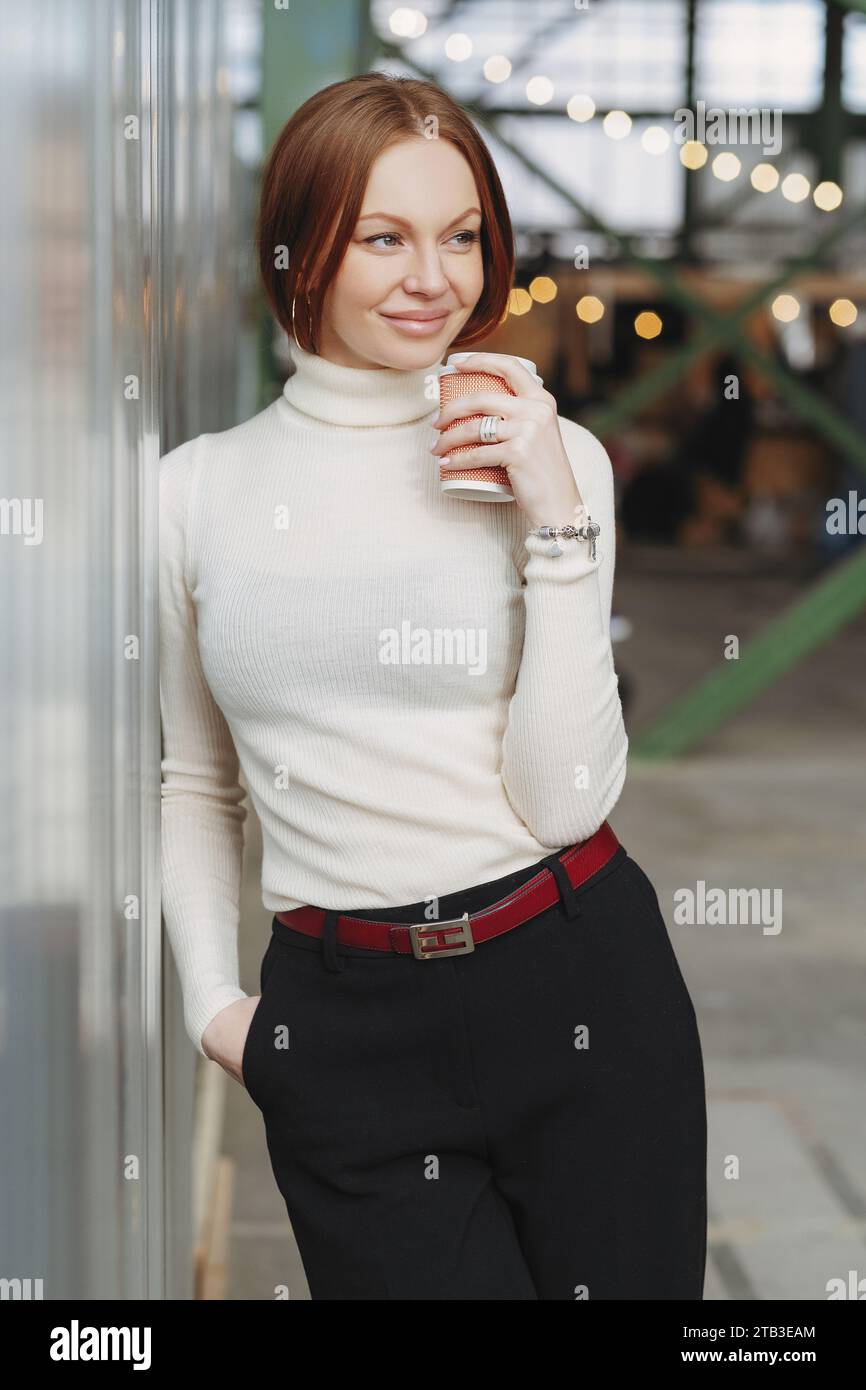 Woman in white turtleneck hi-res stock photography and images - Alamy