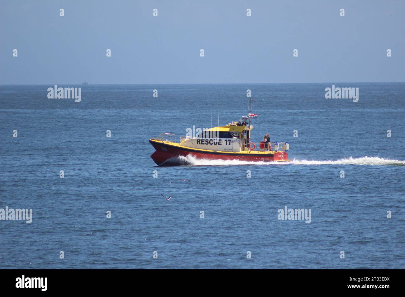 Rescue boat in ocean Stock Photo - Alamy