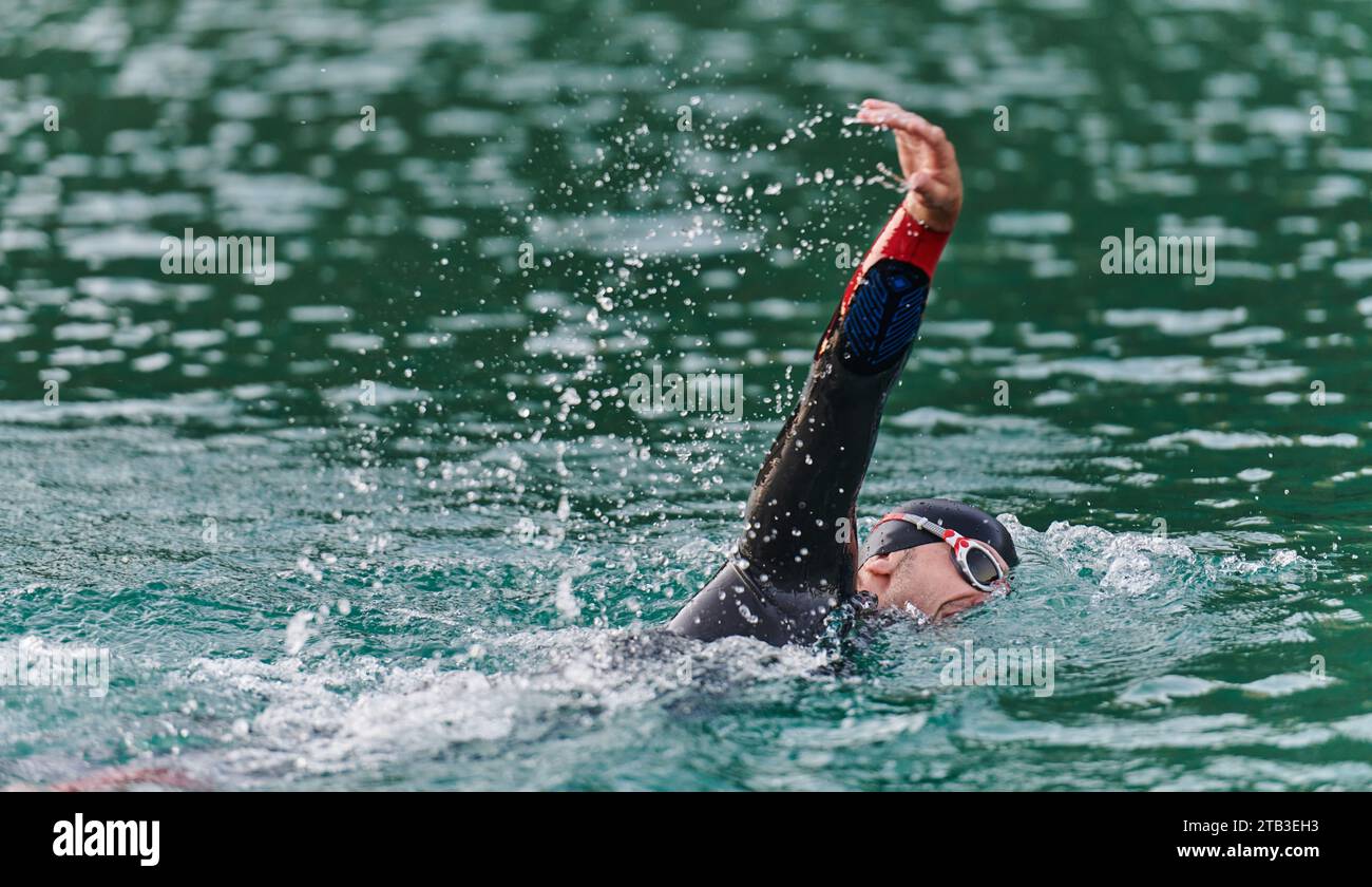 A professional triathlete trains with unwavering dedication for an ...
