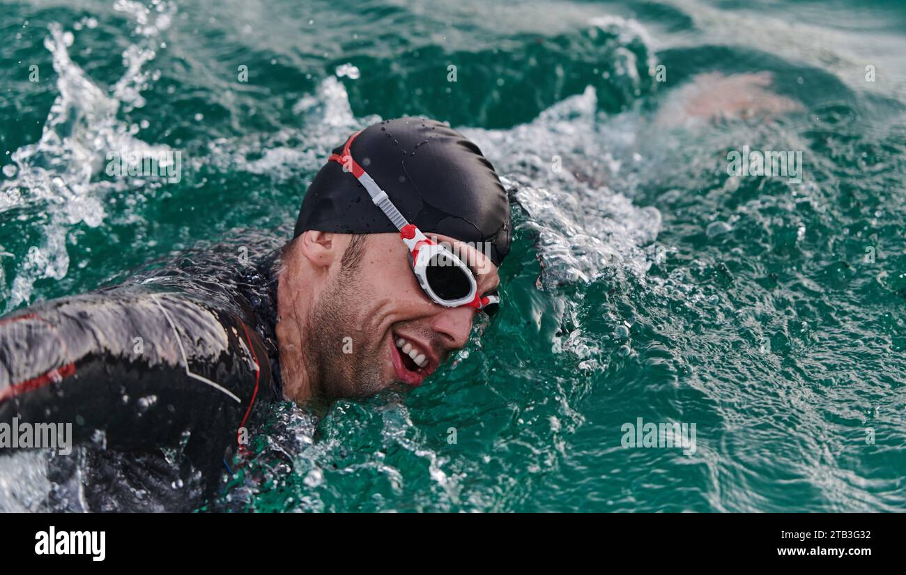 A professional triathlete trains with unwavering dedication for an ...