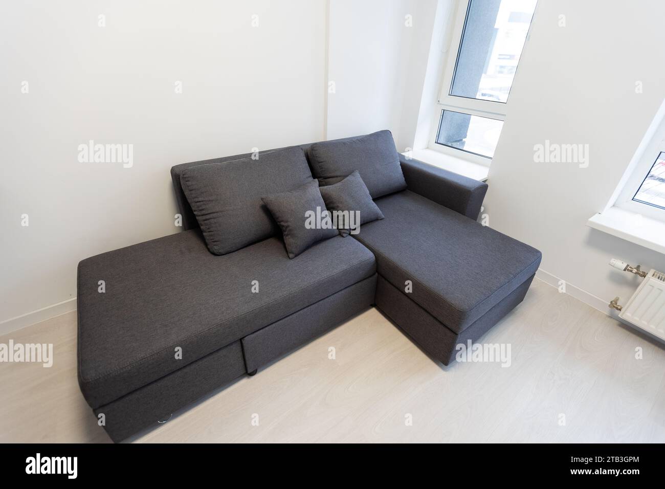 One sofa in side angle Stock Photo - Alamy