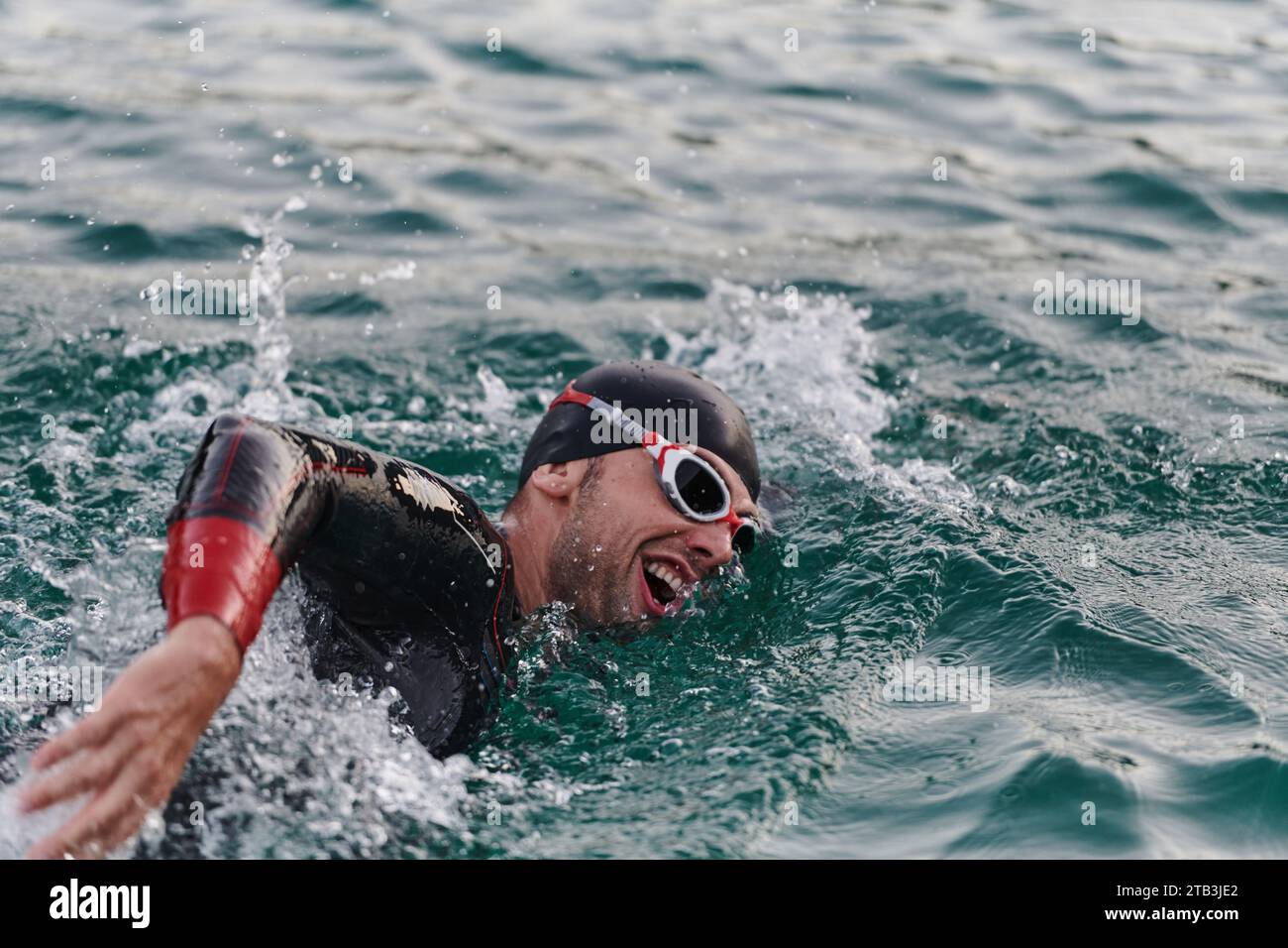 A professional triathlete trains with unwavering dedication for an ...