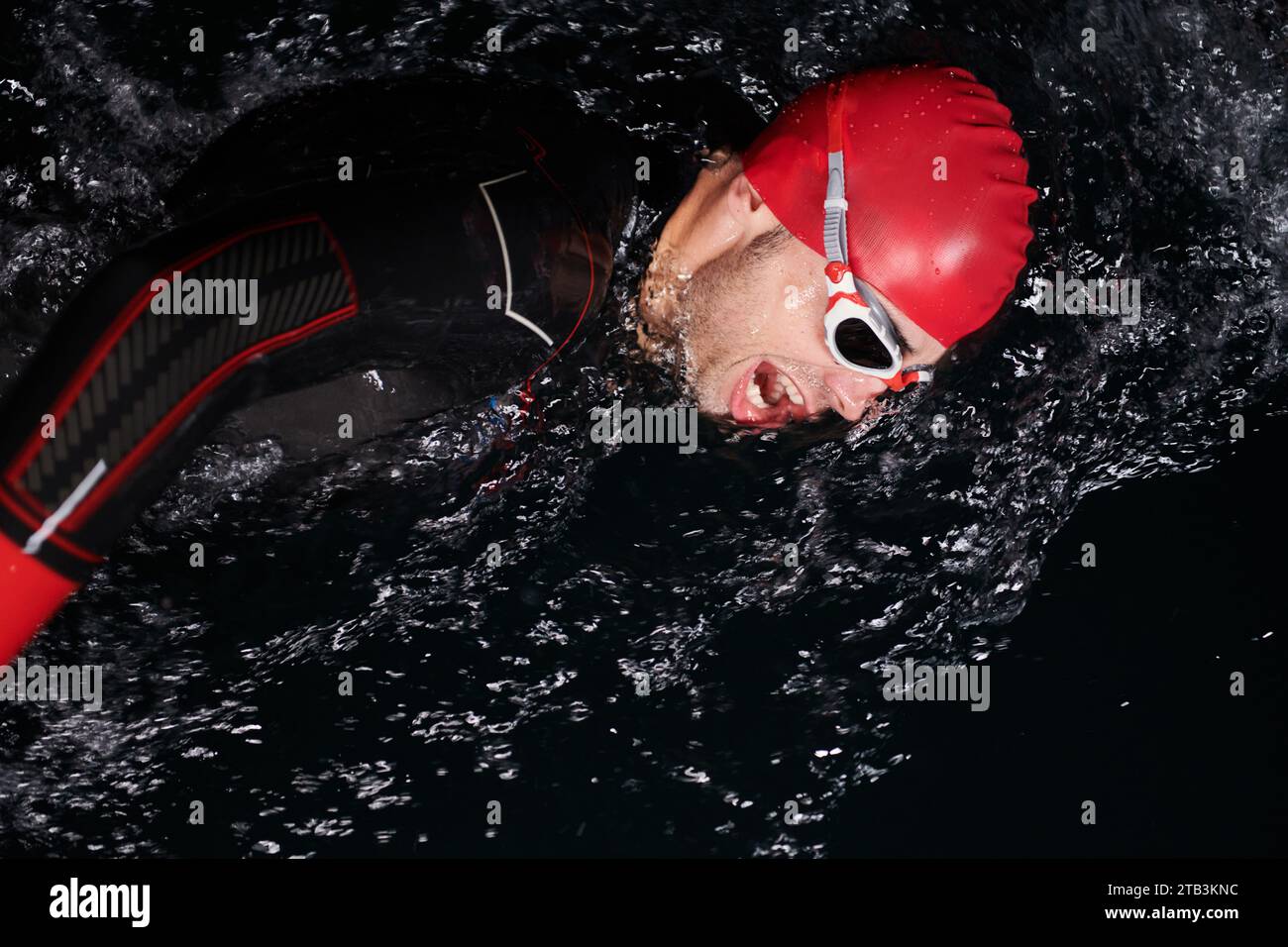 A determined professional triathlete undergoes rigorous night time ...