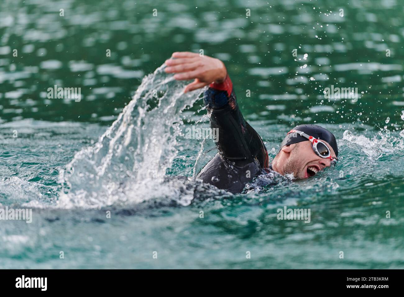A professional triathlete trains with unwavering dedication for an ...