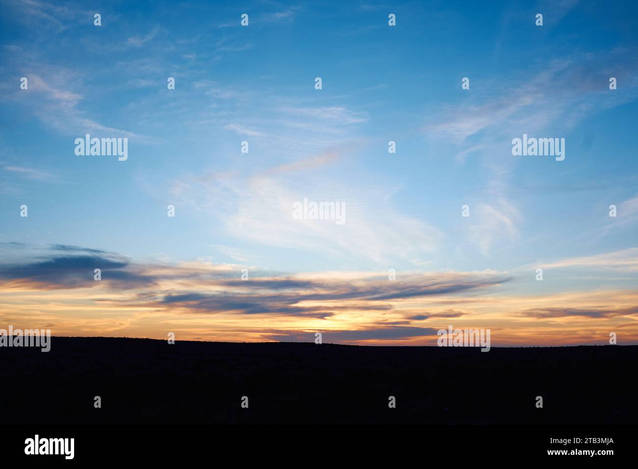 a very dramatic sunset in the desert Stock Photo - Alamy