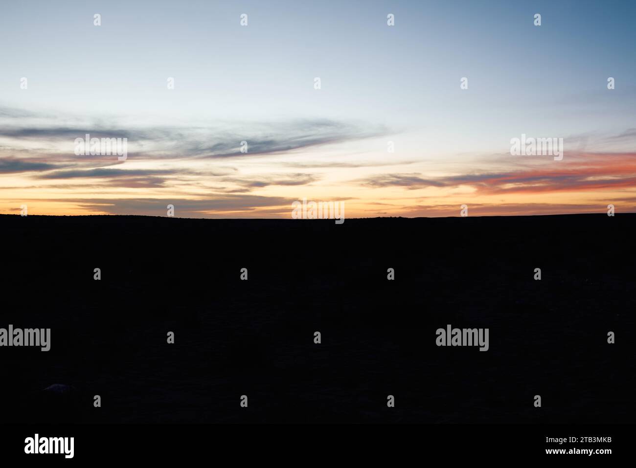 a very dramatic sunset in the desert Stock Photo - Alamy