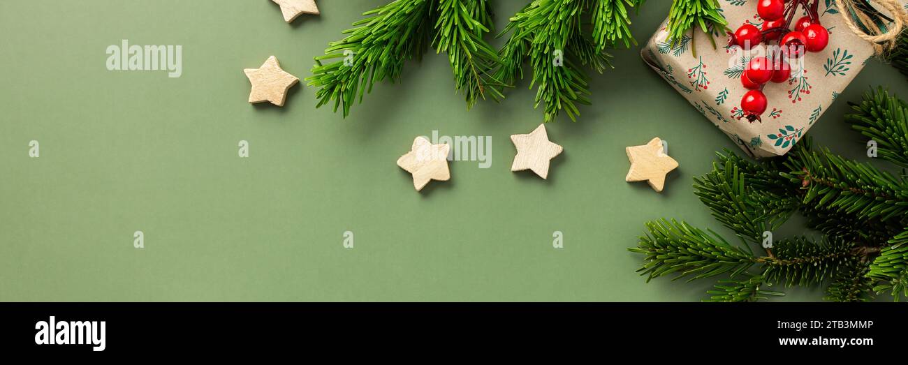 Christmas festive banner, fir branches and gift boxes with a sprig of ...