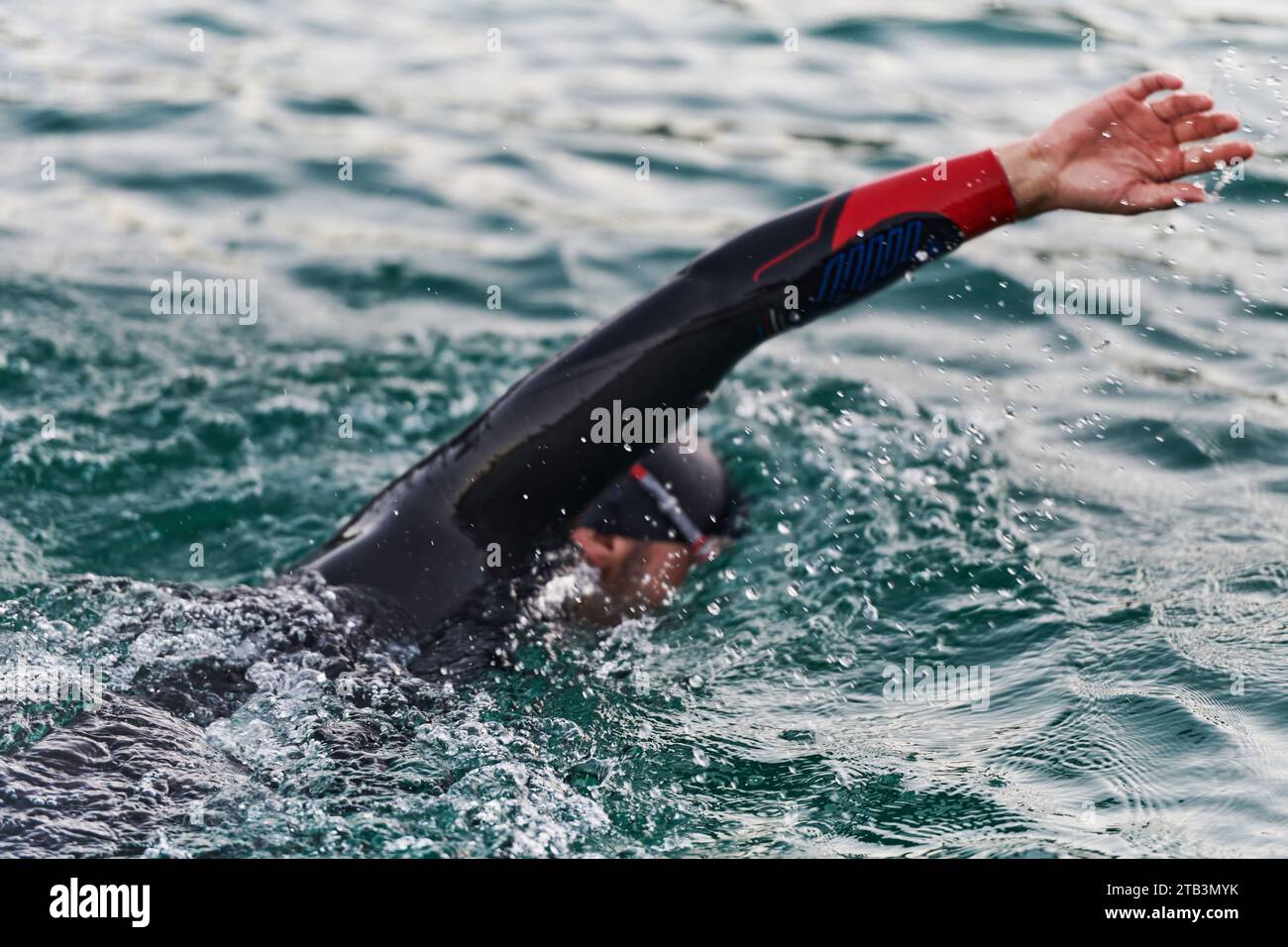 A professional triathlete trains with unwavering dedication for an ...