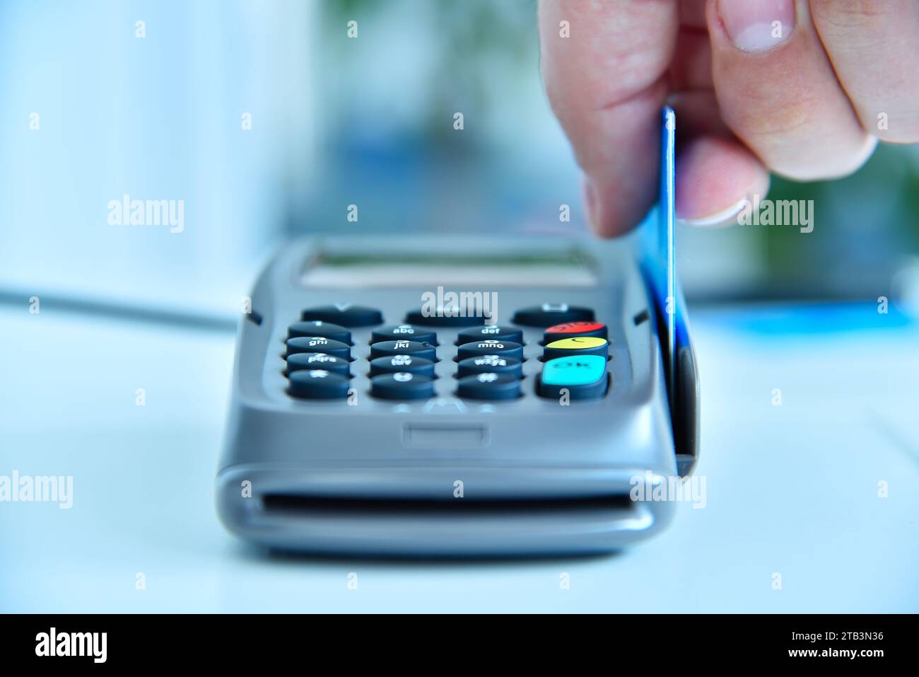 Close up of pay money blue credit card for spending money with payment ...