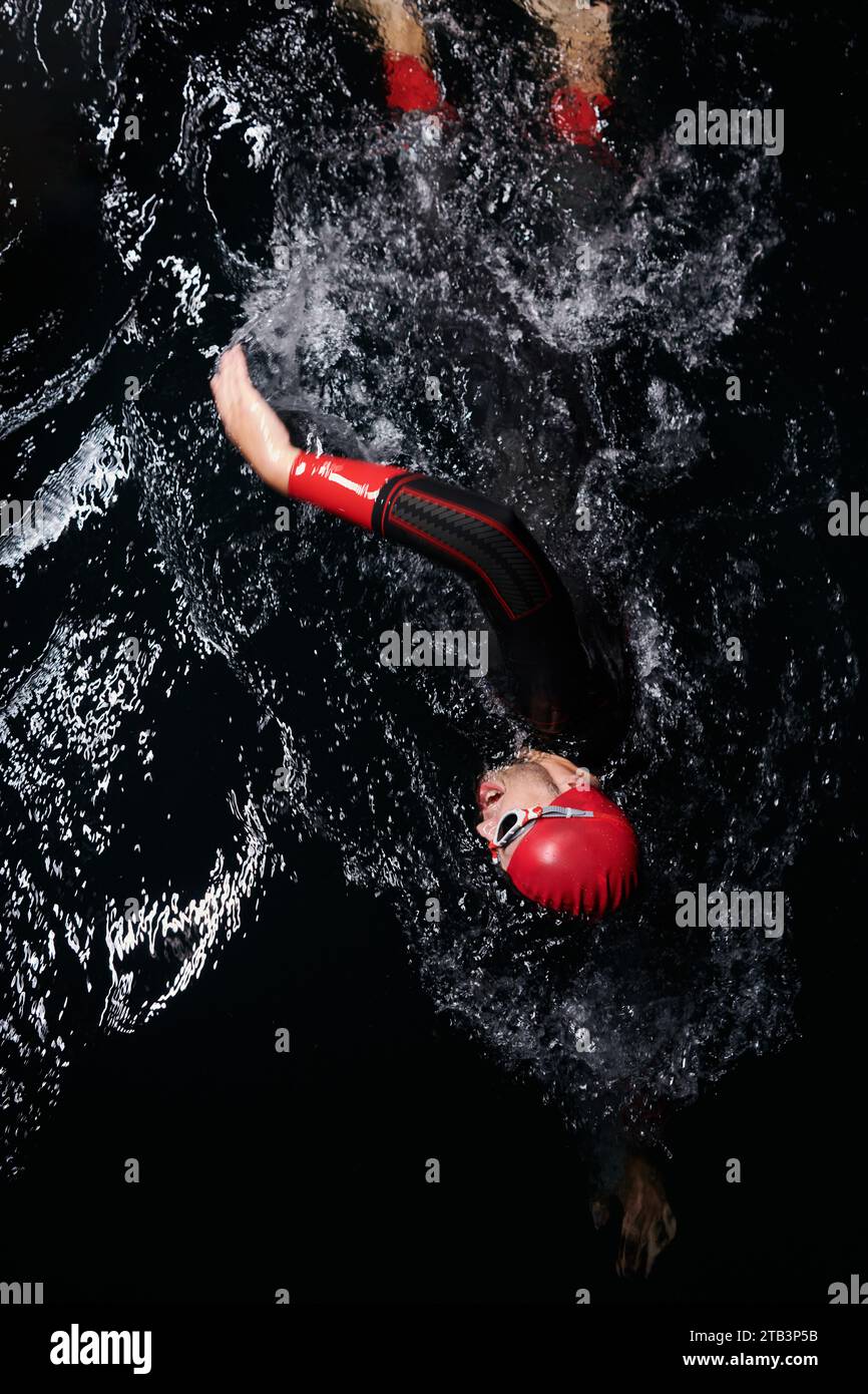 A determined professional triathlete undergoes rigorous night time ...