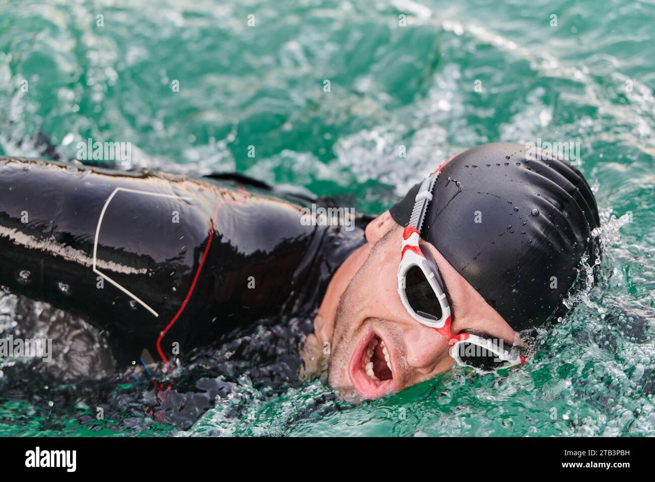 A professional triathlete trains with unwavering dedication for an ...