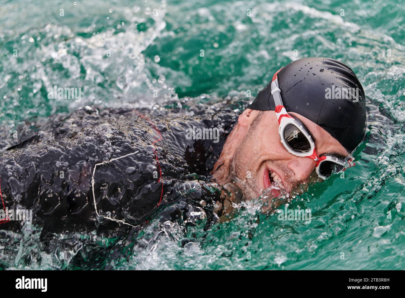 A professional triathlete trains with unwavering dedication for an ...