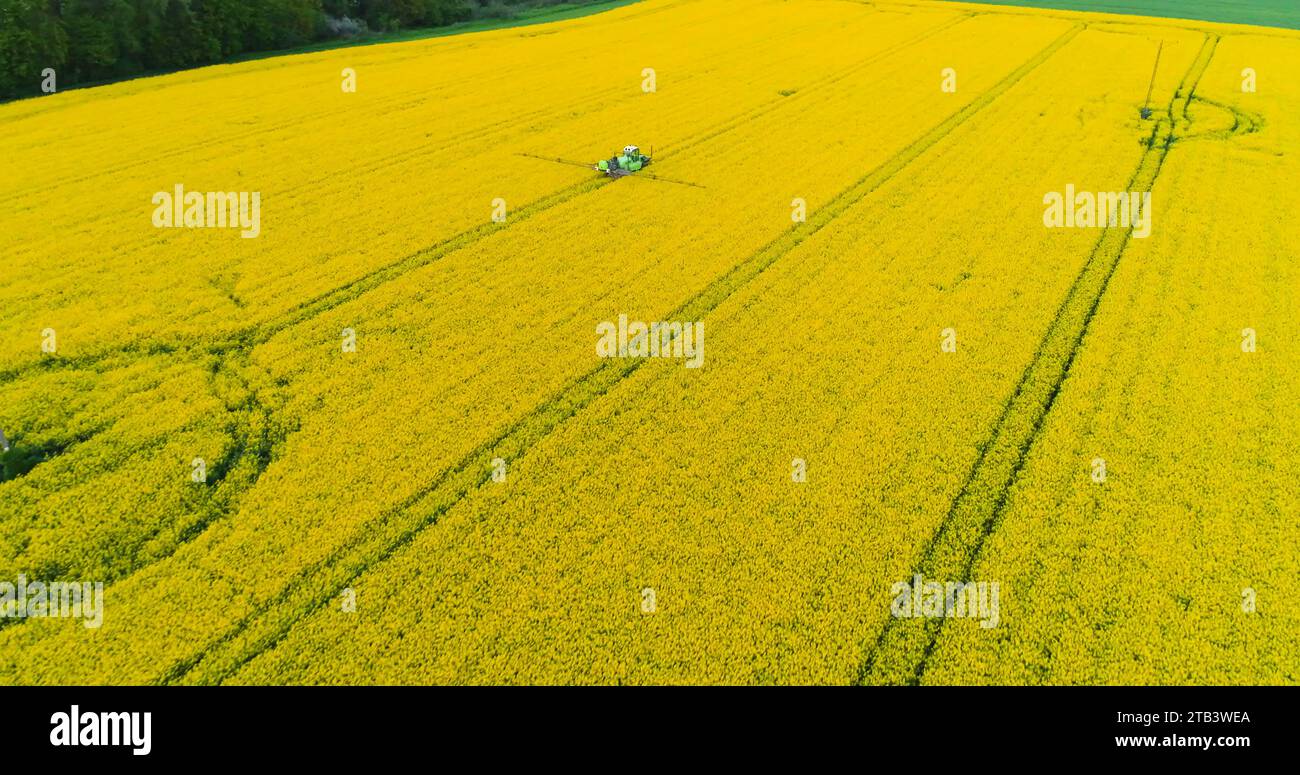 Farm tractor spray field 4k hi-res stock photography and images - Alamy