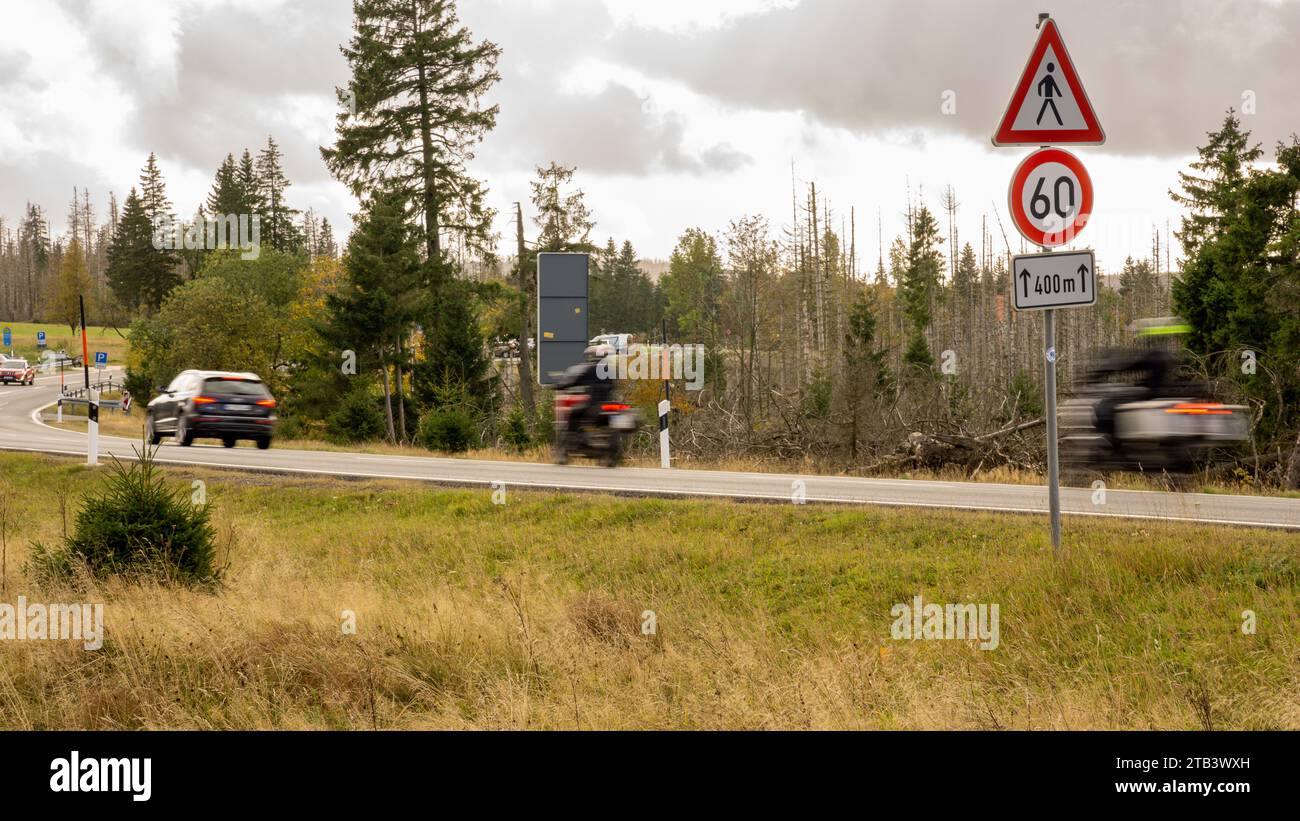 Two Motorcycles driving fast on the land streets in the middle of the ...