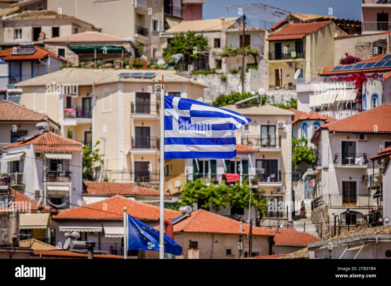 Greek Flag Waving in the Wind in Parga, Greece. Picturesque Coastal ...