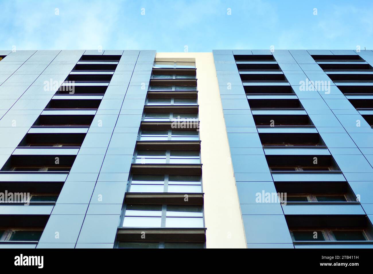 Multistory new modern apartment building. Stylish living block of flats ...