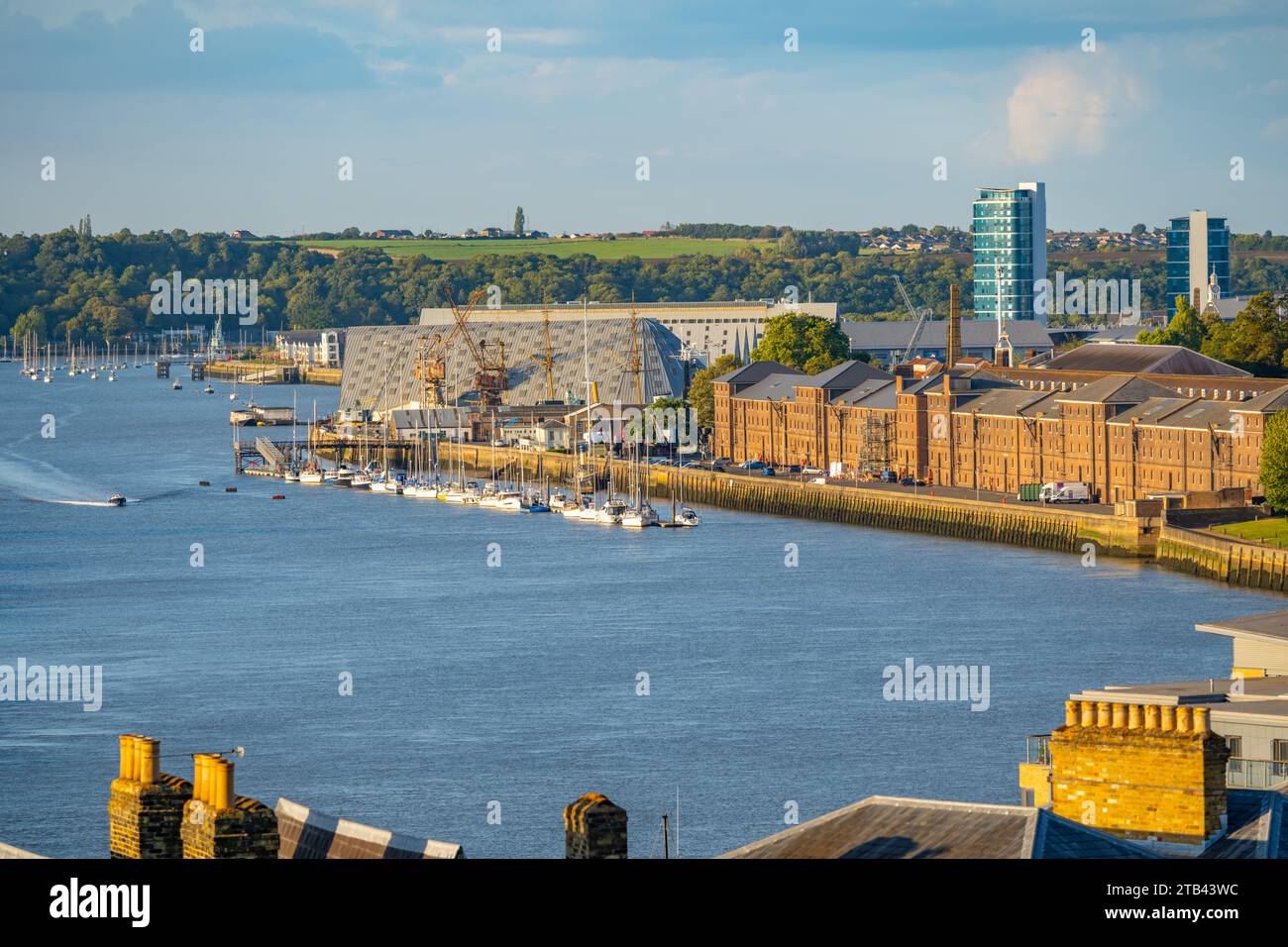 The buildings of Chatham Maritime Museum and the river Medway, from ...