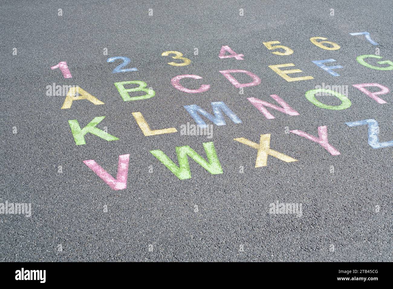the alphabet and numbers are drawn with color paint on a children's ...