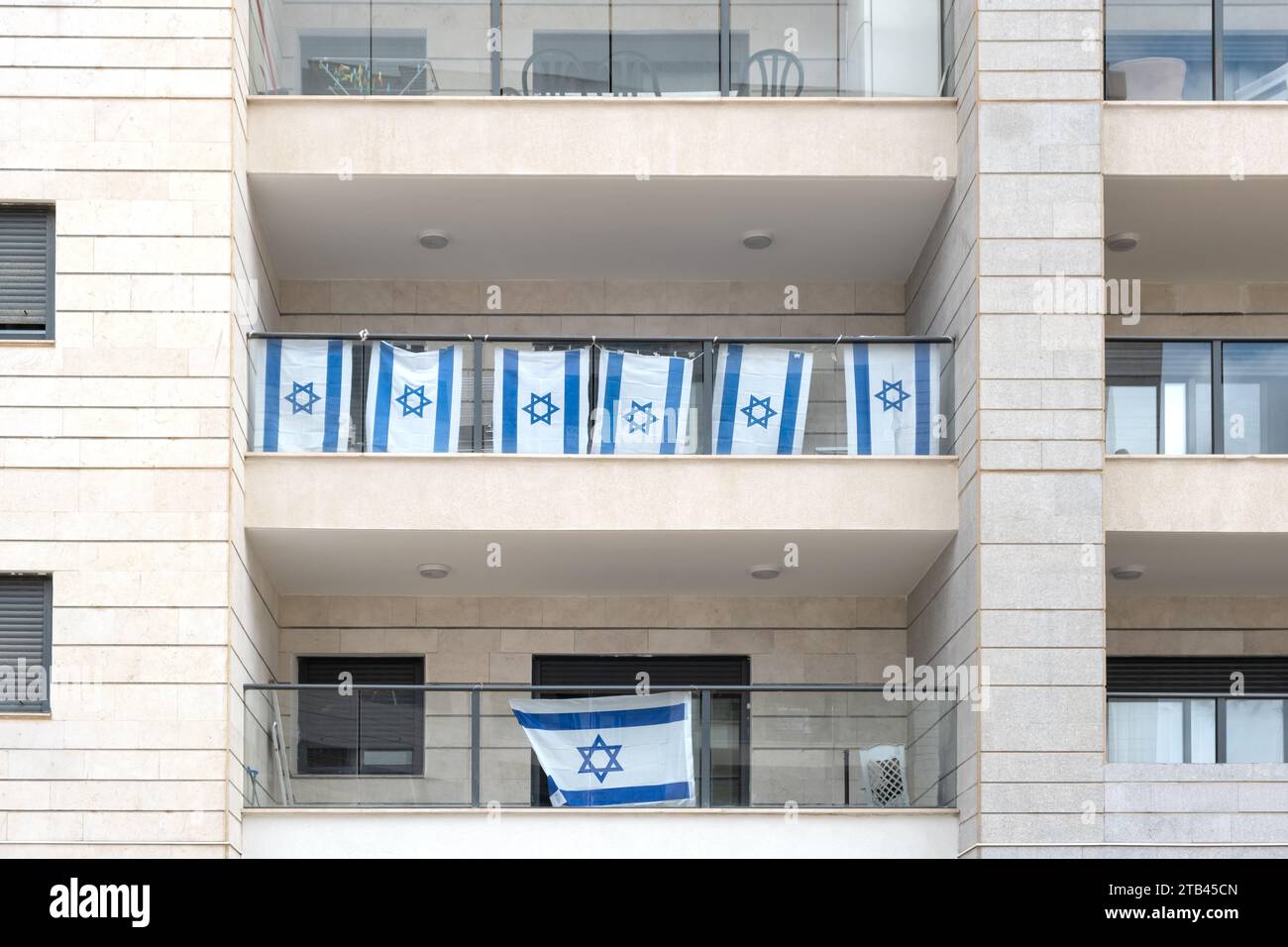 Flags on building in Israel, new apartment. Development, Building new ...