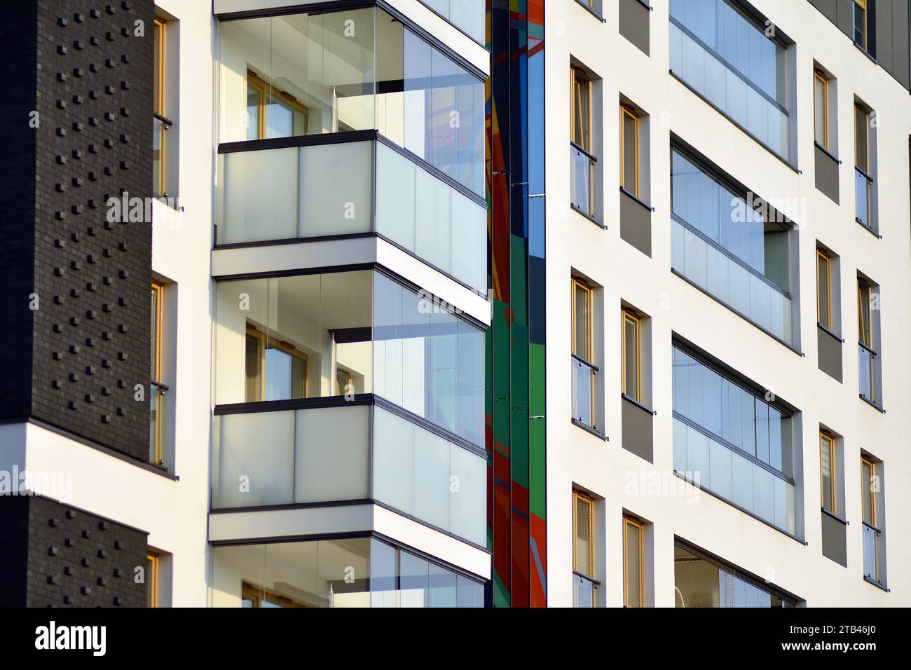 Multistory new modern apartment building. Stylish living block of flats ...