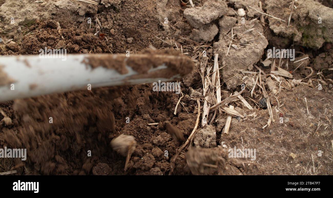 Farmer examining soil in hands hi-res stock photography and images - Alamy