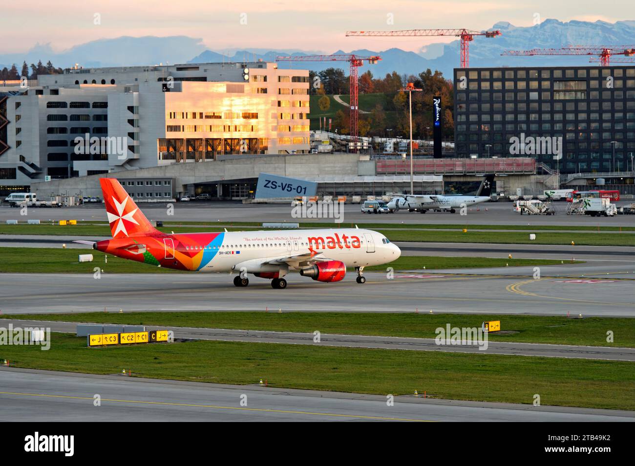 Airbus 320 of the airline Air Malta taxis to the departure runway ...