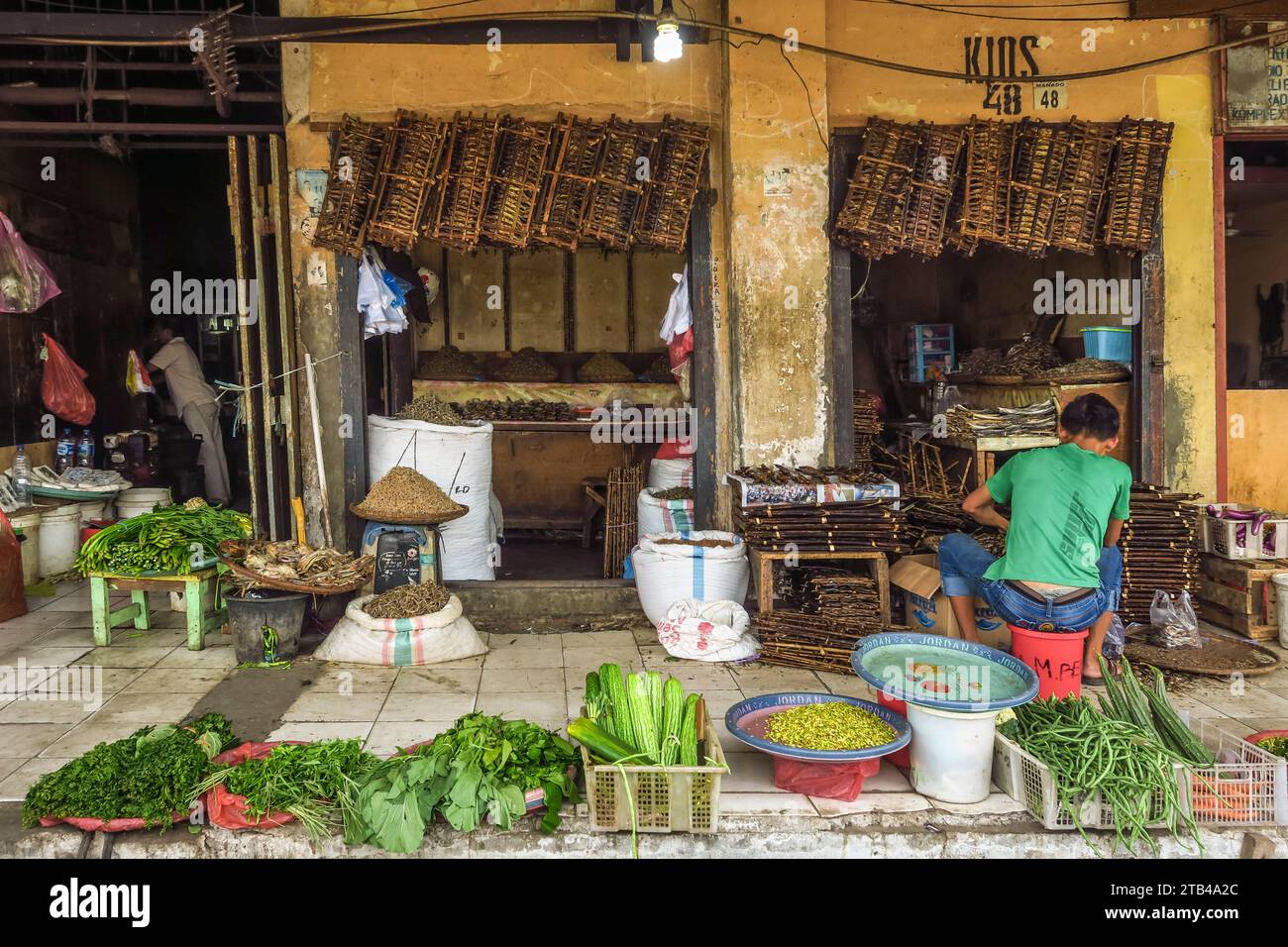Vegetables & dried cooked fish in frames at the port in the provincial ...
