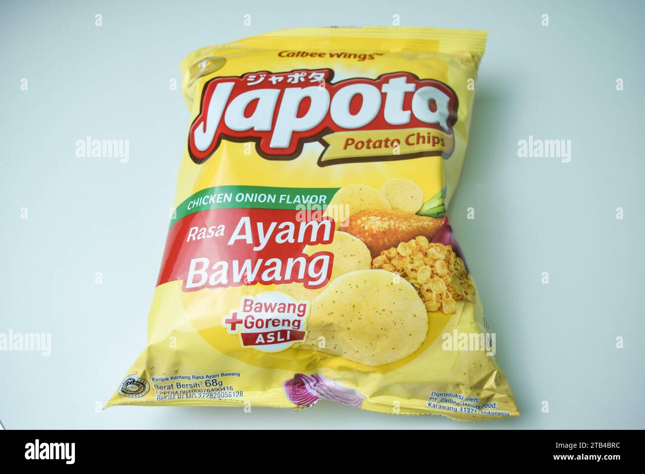 Potato chips Japota snack with onion chicken flavor on a white ...