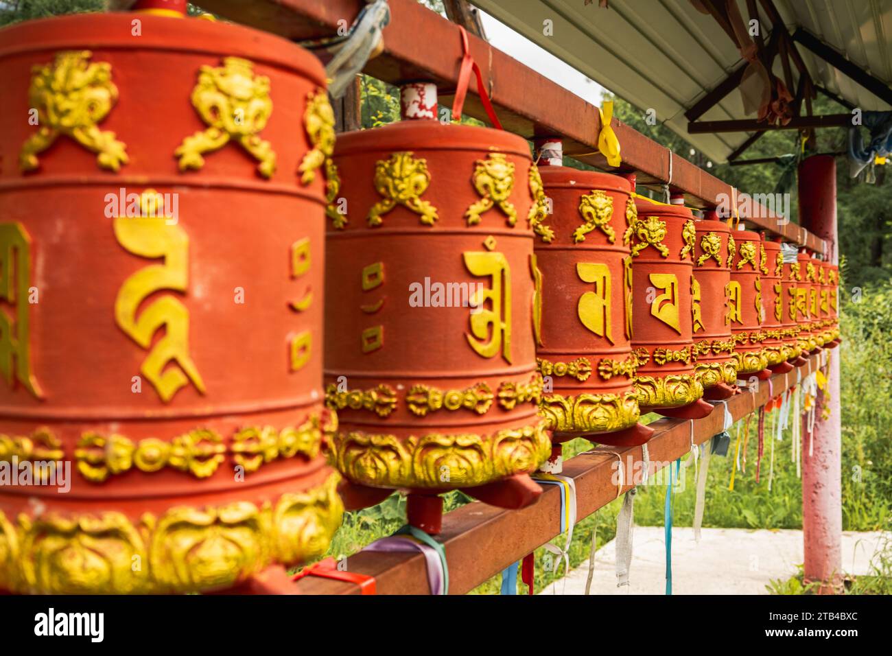 Rotating religious elements for touching turning spinning Buddhist ...