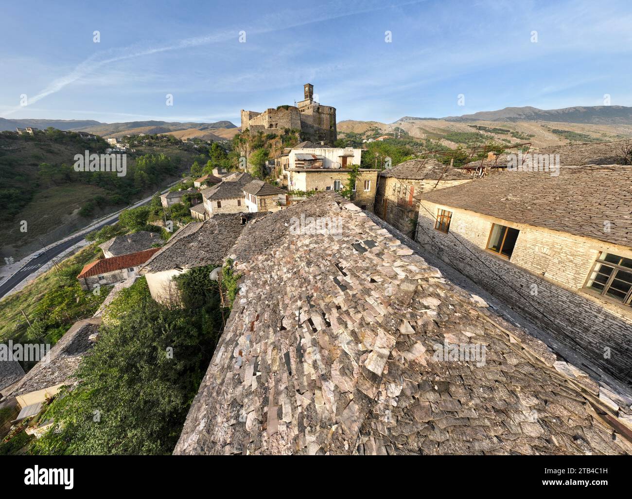 Gjirokaster castle with Clock tower, ottoman architecture houses in ...