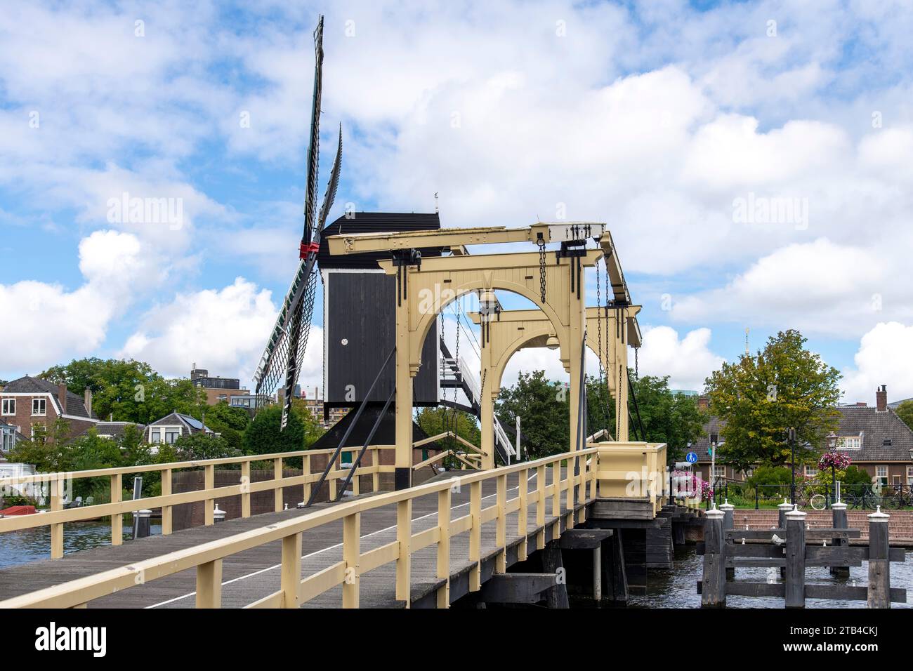 Historic windmill De Put and Rembrandt bridge in the Rijn River in the ...