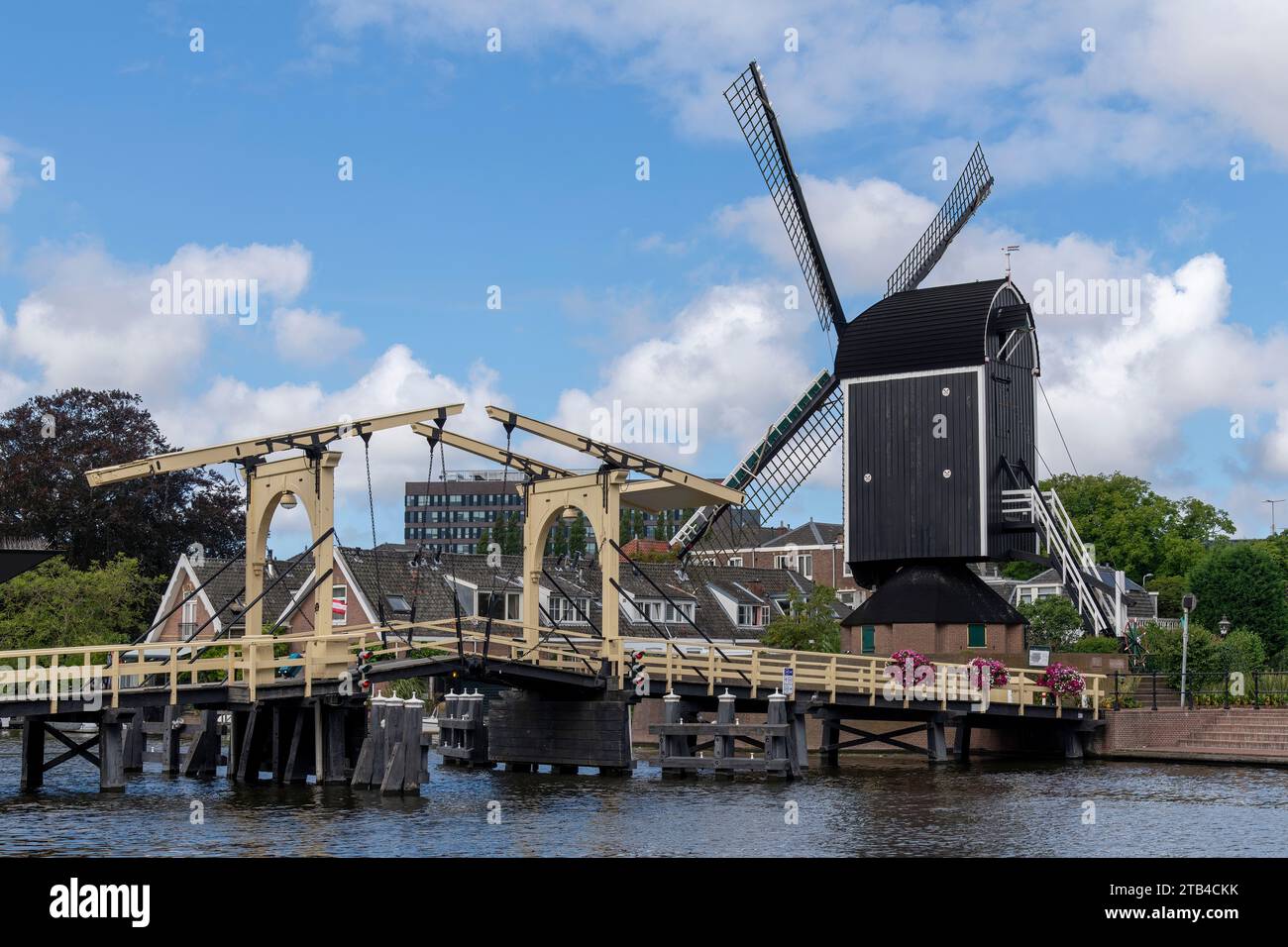 Historic windmill De Put and Rembrandt bridge in the Rijn River in the ...