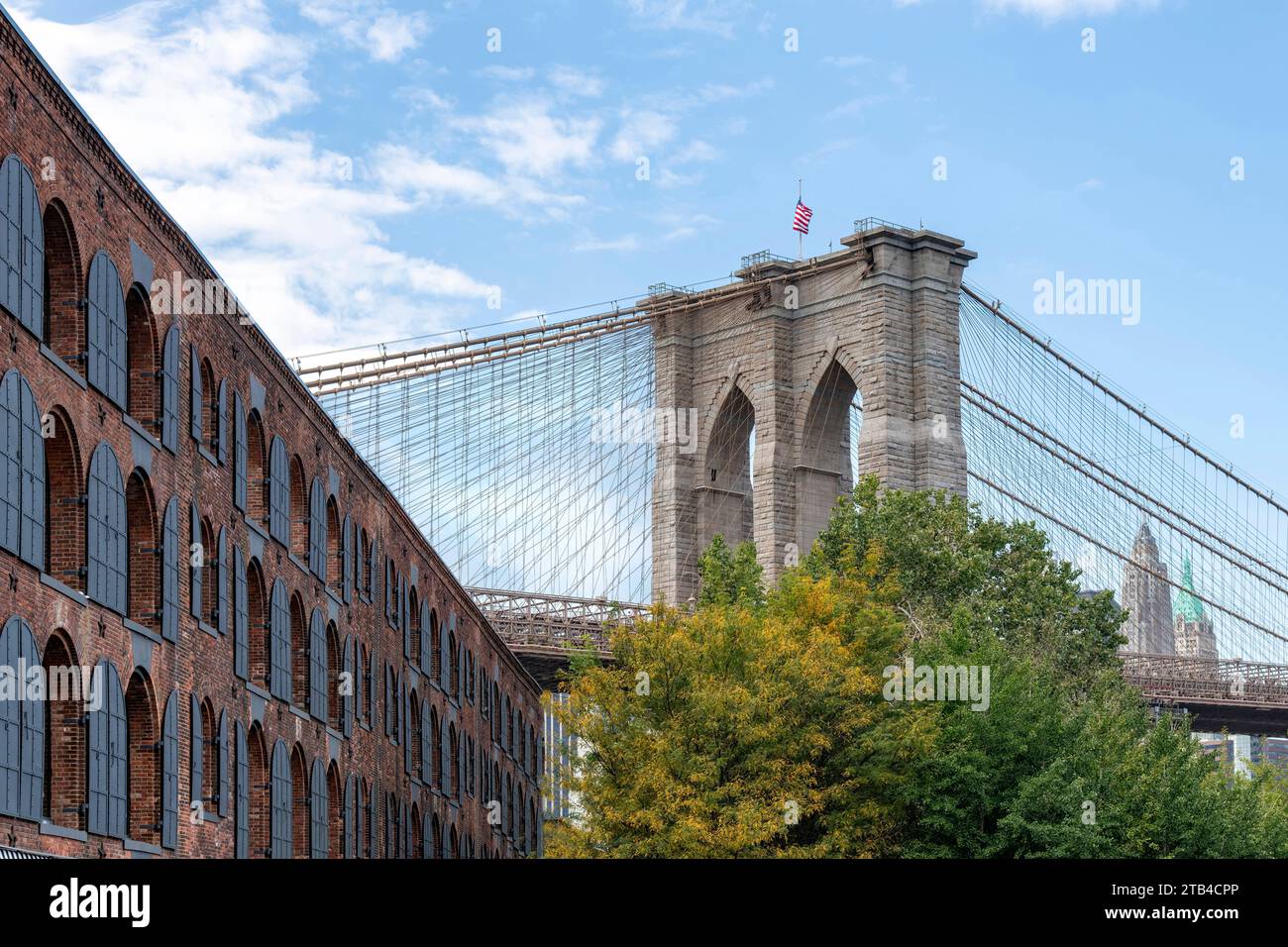 Low angle view Brooklyn Bridge with Lower Manhattan, New York City in ...