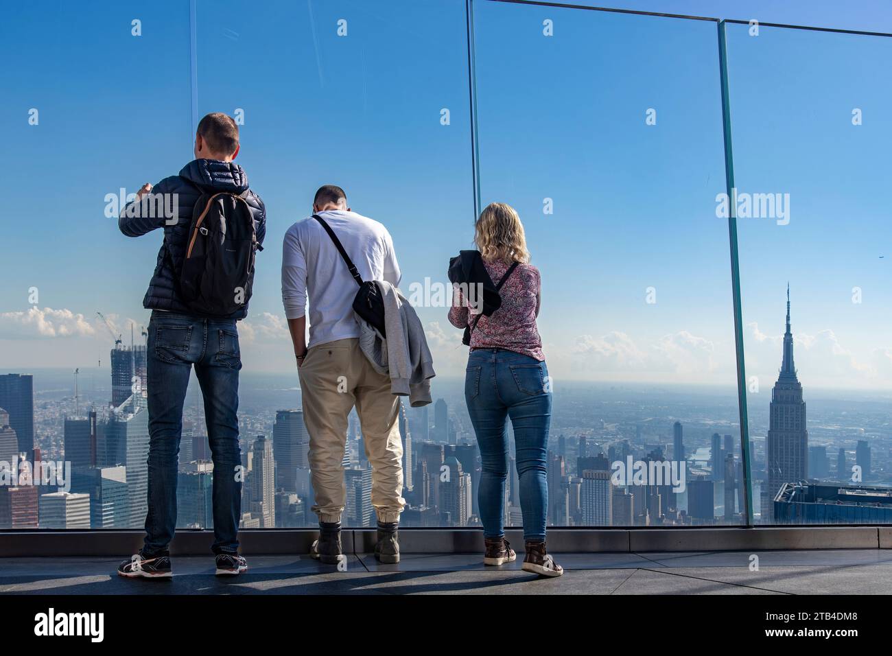 New York City, NY, USA-October 11, 2023: Three people standing at the ...