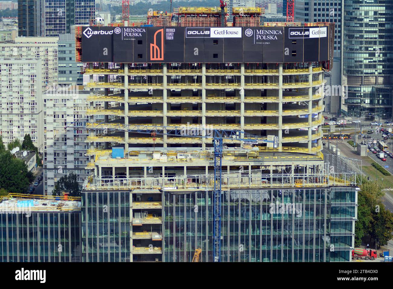 High rise building under construction. Installation of glass facade ...