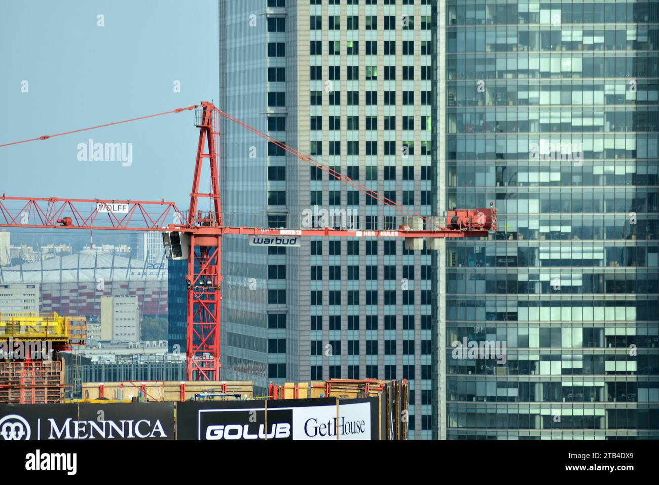 High rise building under construction. Installation of glass facade ...